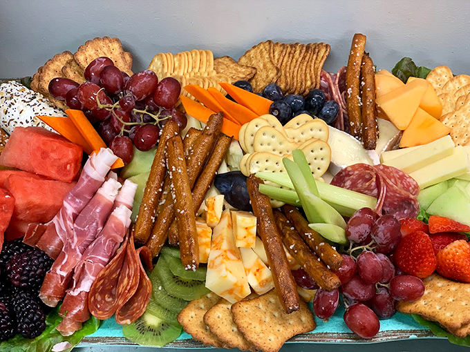 A colorful feast that's part artwork, part snack attack - where pretzels and fruit dance with cheese and meat.
