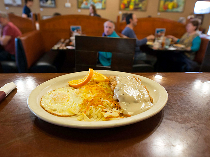 Holy gravy, Batman! This chicken fried steak is so good, it might just solve world peace. Or at least make you forget about your problems for a while. Photo credit: 5th Avenue Cafe