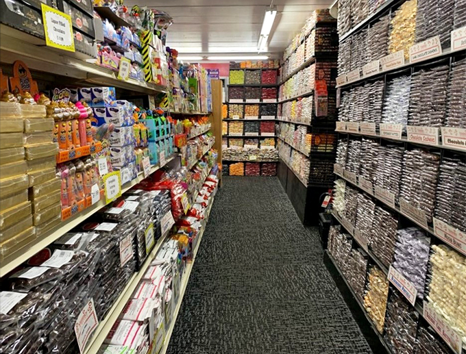 Dark, milk, and white treasures stacked like edible gold bars in this Fort Knox of chocolate delights.