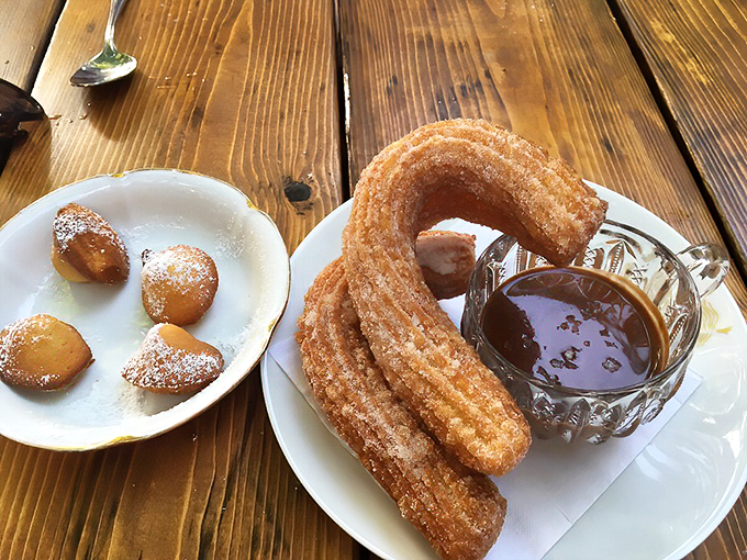 Churros and chocolate: The ultimate Spanish power couple. Crispy, sugary sticks of joy paired with a dip so rich it could buy a small country.