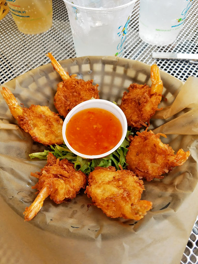 Like little golden crowns arranged in a circle, these coconut shrimp are ready for their royal entrance.