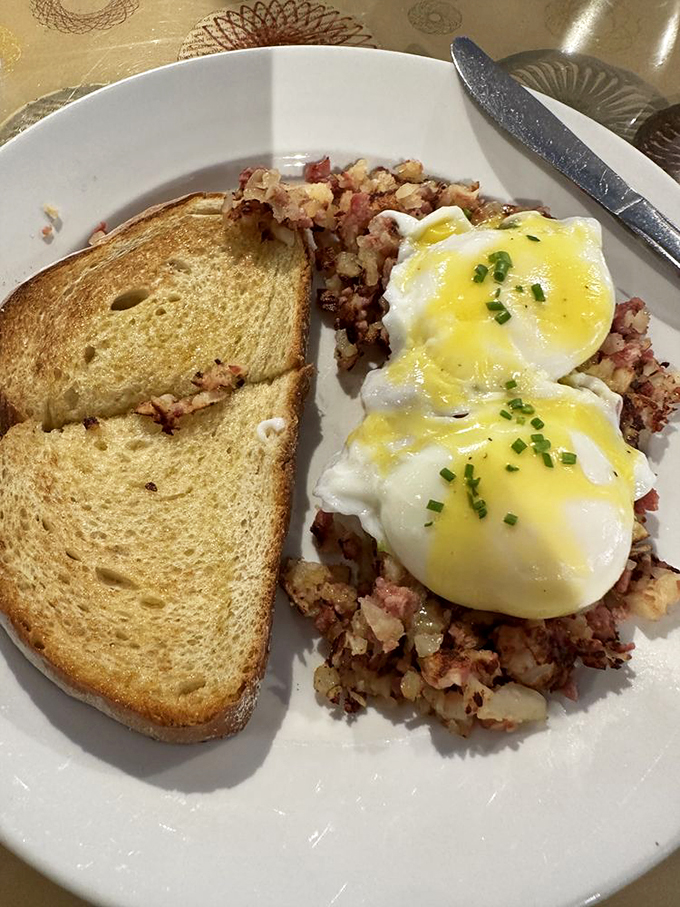 Another angle of breakfast nirvana - those eggs are doing their best impression of sunshine, while the hash plays the delicious supporting role. Photo credit: Dave R.