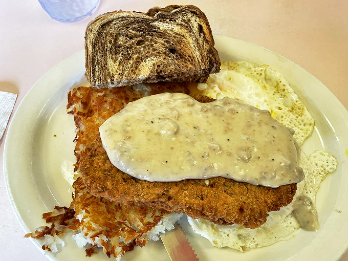 Crispy, golden, and smothered in gravy - this country fried steak is the Paul Bunyan of comfort foods, ready to tackle even the mightiest appetite.
