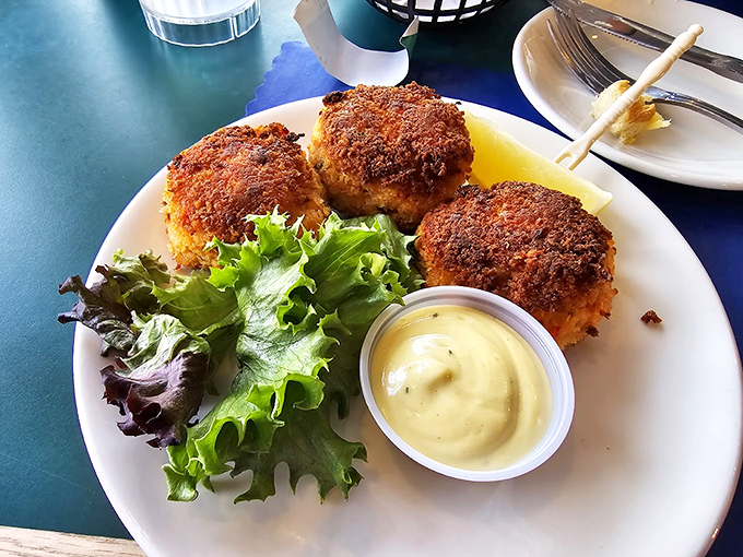 These crab cakes aren't just appetizers &ndash; they're little golden discs of joy, served with enough remoulade to make any seafood lover swoon.