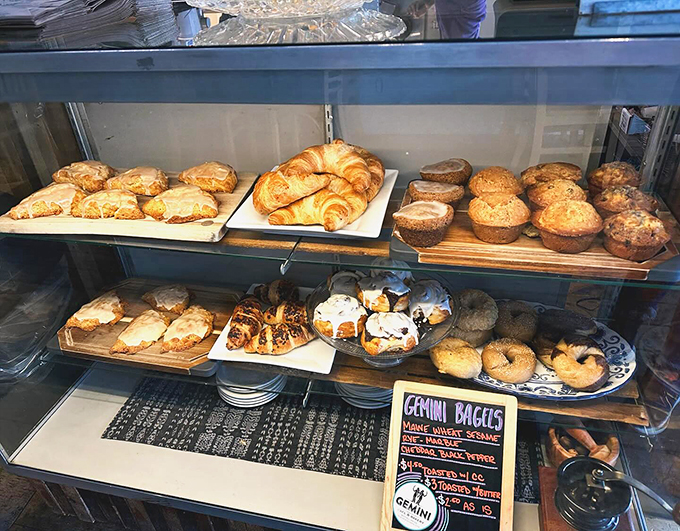 A treasure chest of carbs where every shelf tells a different delicious story. Those croissants are calling your name. 