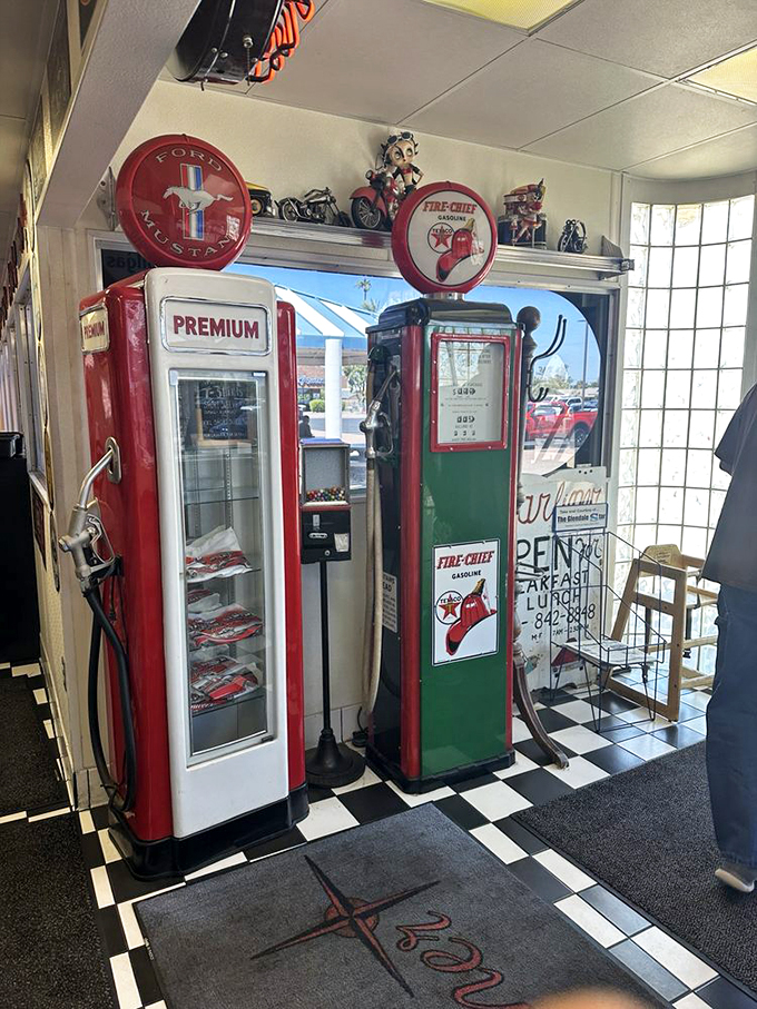 Vintage gas pumps and automotive memorabilia transport you to an era when service stations were social hubs.