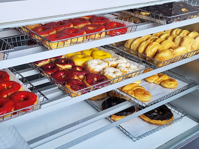 Like a museum of morning happiness, these display cases showcase everything from simple glazed to fancy fruit-topped creations.