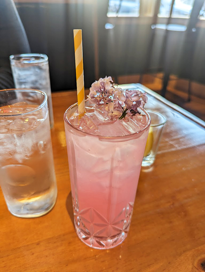 This rosy cocktail, garnished with fresh flowers, looks like something a fairy godmother would serve at happy hour. 
