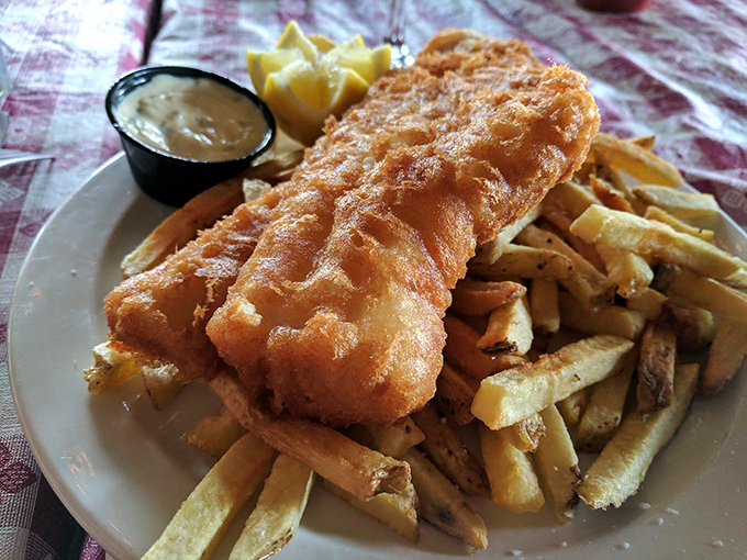 Golden-battered fish and chips that would make a New England fisherman weep with joy, served with house-made tartar sauce. Photo credit: Ryan Ketterer