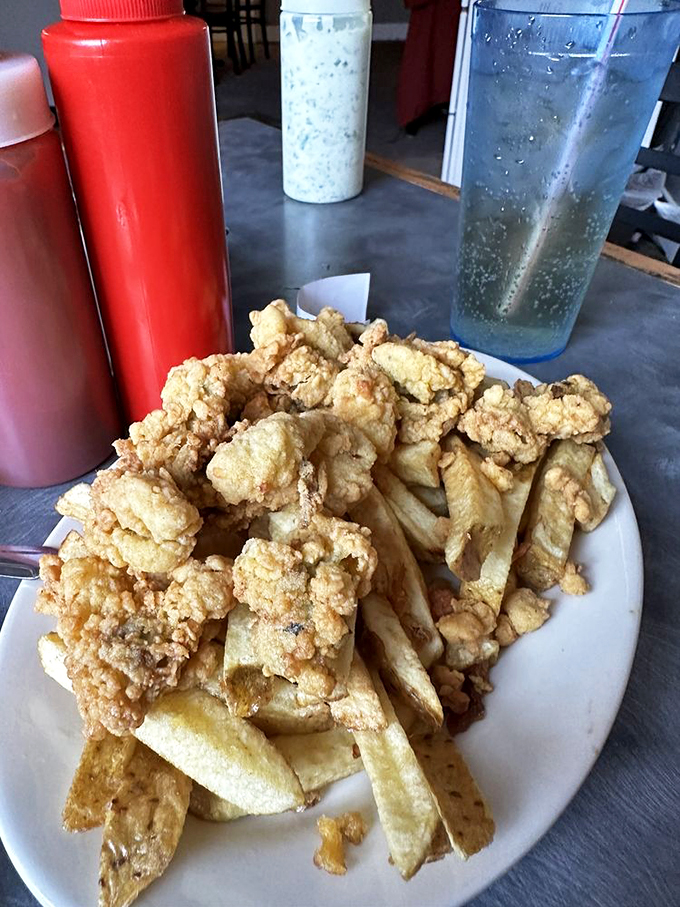 Fried clams and fries: the dynamic duo of comfort food. These golden nuggets of joy are crunchier than your old mixtapes and twice as satisfying.