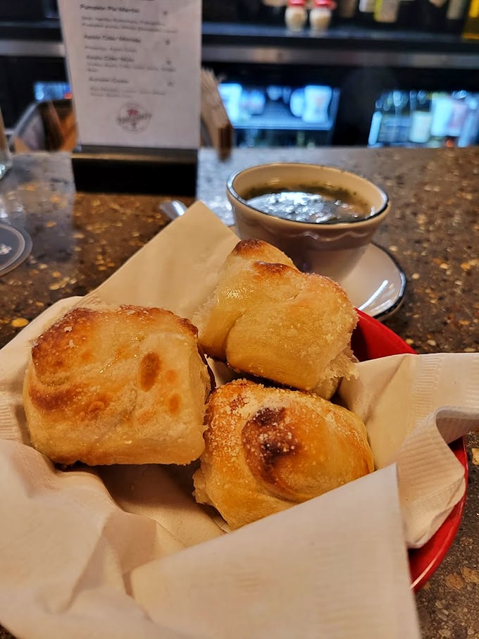 Golden-brown pillows of garlicky goodness nestled in their basket, waiting to make your carb dreams come true.