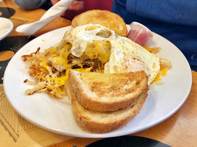 Behold, the leaning tower of deliciousness! This gravity-defying sandwich is what happens when breakfast and Thanksgiving have a delicious love child.