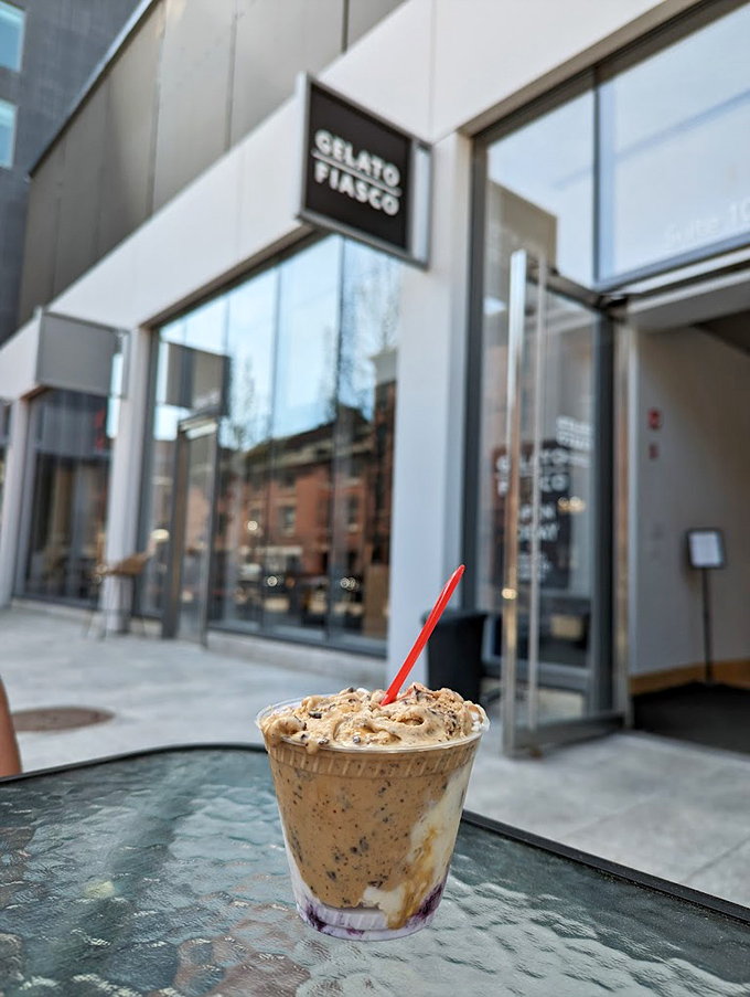 A perfectly swirled creation sits pretty outside the shop, showing off layers of flavor against Portland's urban landscape.