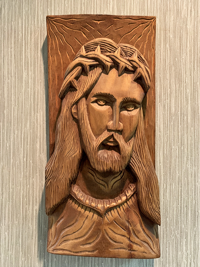 Face to face with the divine! This intricate wood carving of Jesus is so lifelike, you'll swear those eyes follow you around the room.