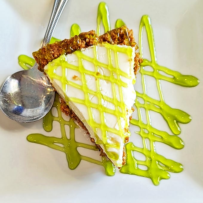 A slice of Florida sunshine on a plate. This key lime pie strikes the perfect balance between tart and sweet, with a crust to die for.