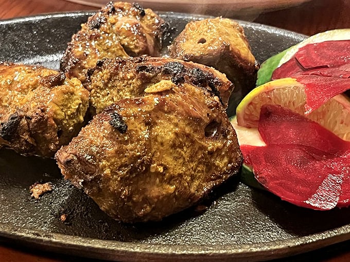Tandoori lamb that's charred to perfection, served with a rainbow of fresh vegetables. It's like edible artwork on a plate. Photo credit: Tom F.