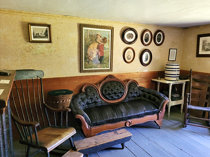 This parlor's tufted velvet sofa has probably heard more secrets than a small-town hairdresser's chair ever could.