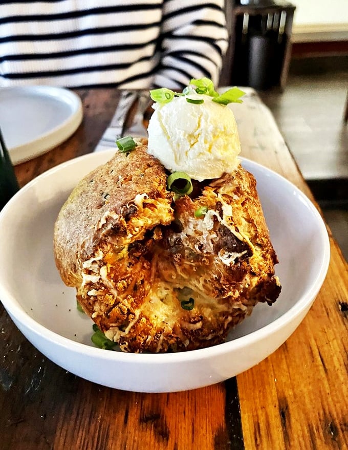 Perfectly seared salmon wearing a caper butter sauce like a designer dress, with Brussels sprouts playing a delicious supporting role.