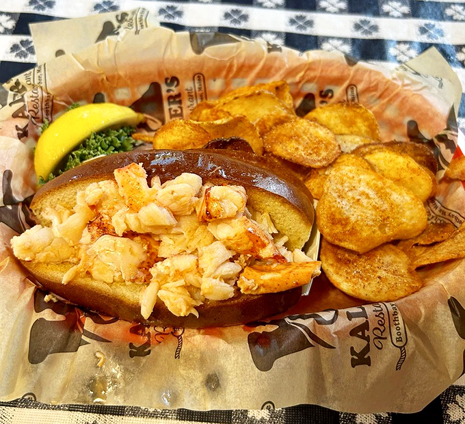 Simple perfection: chunks of fresh lobster meat nestled in a toasted roll, served with house-made chips that'll make you forget store-bought exists. 