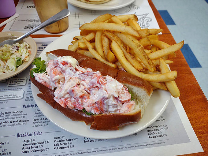 The lobster roll that launched a thousand road trips, served with crispy fries and zero regrets.