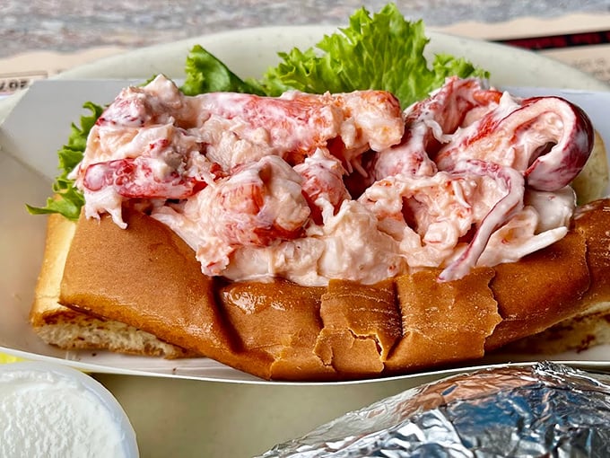 A proper Maine lobster roll: Simple, generous, and perfectly dressed. Just like your favorite aunt at a summer wedding.
