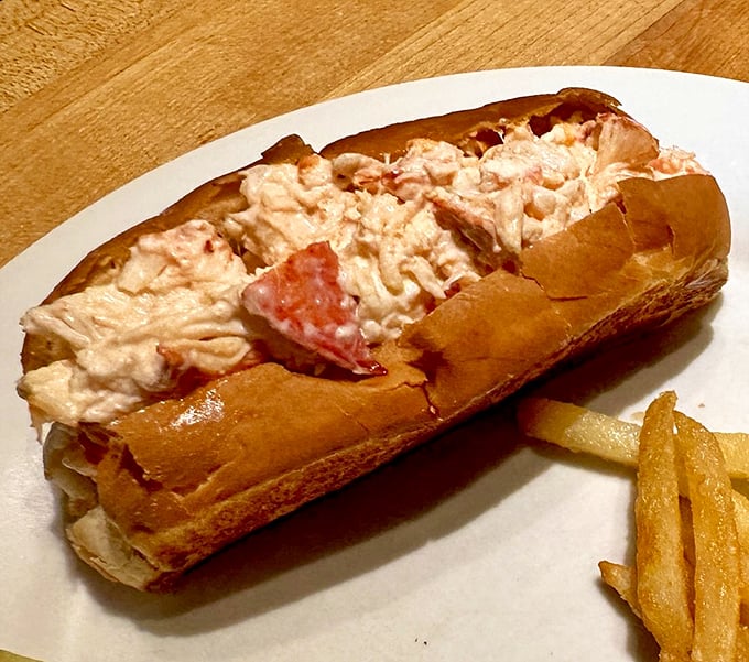 Chunks of sweet lobster meat nestled in a toasted roll &ndash; it's like summer vacation decided to become a sandwich.