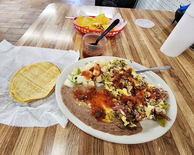 Shredded beef and eggs: the breakfast combo you never knew you needed. It's like a rodeo in your mouth!