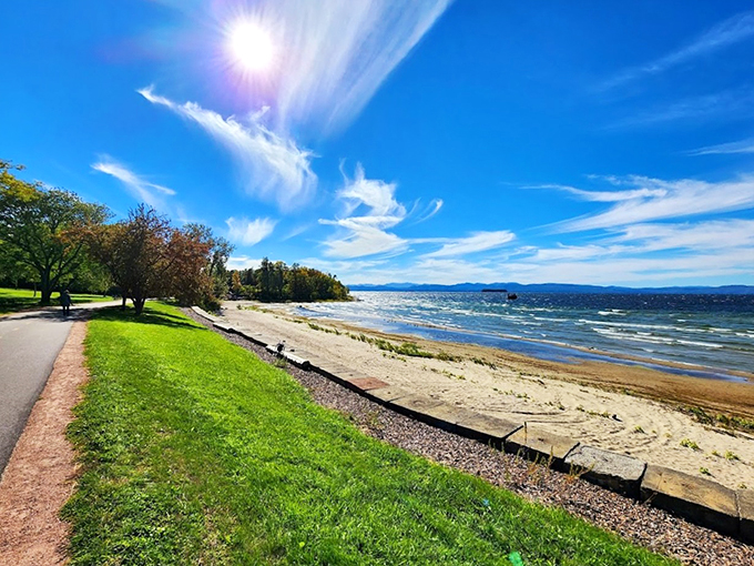 Lake Champlain provides a stunning natural backdrop to this remarkable stone installation, perfect for sunset viewing.