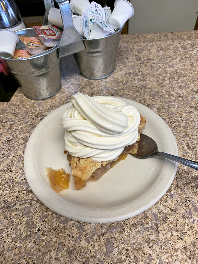 Sunshine on a plate! This peach pie is so good, it might just make you forget about those other stone fruits. Sorry, plums. Photo credit: Robert B.