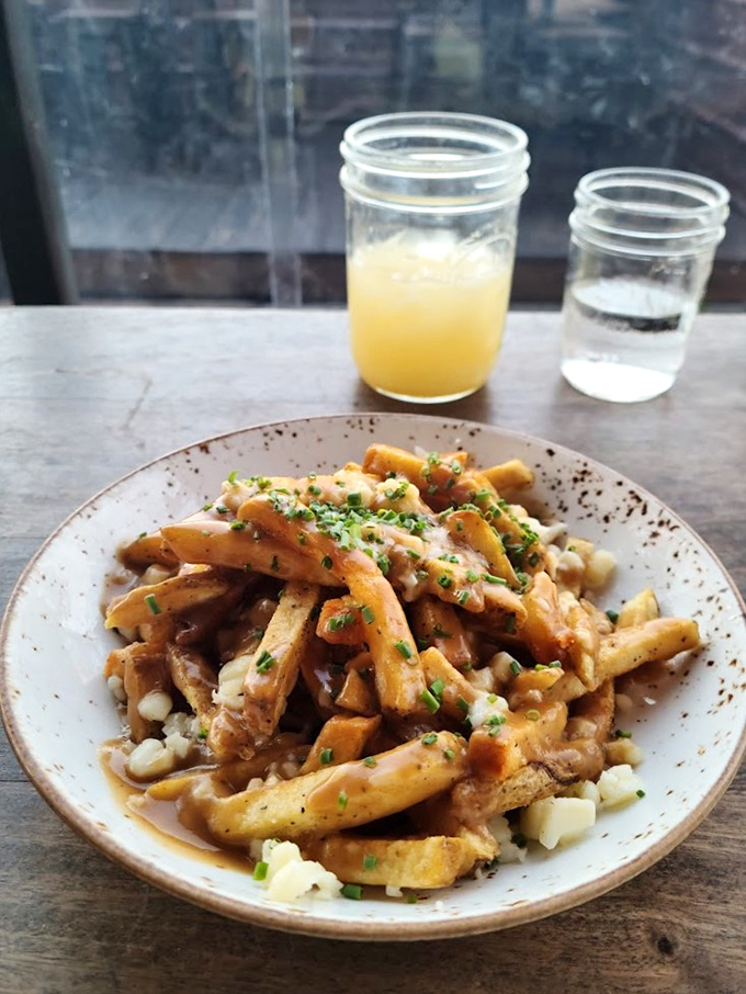 A masterpiece of crispy fries, melty cheese curds, and rich gravy that makes you question all other potato preparations.