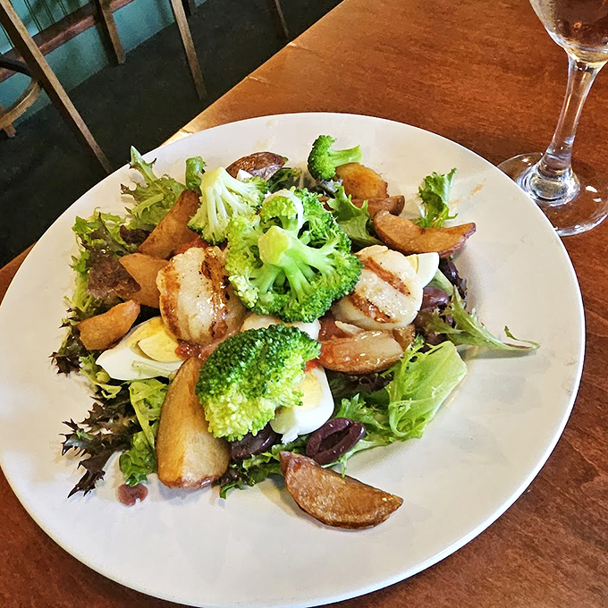 Fresh greens, perfectly roasted potatoes, and tender broccoli come together in a salad that's both hearty and refined.