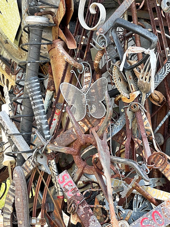 Political statements spiral across the elephant's crown, turning this roadside attraction into a thought-provoking time capsule.