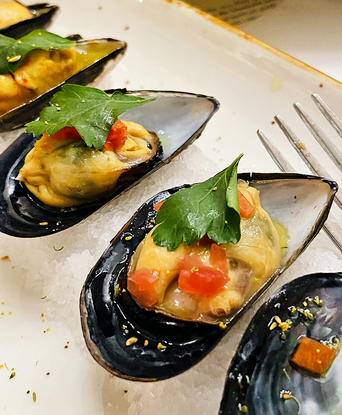 Mussels that could make Poseidon himself swim upstream. Each bite is a tiny ocean of flavor, no snorkel required.