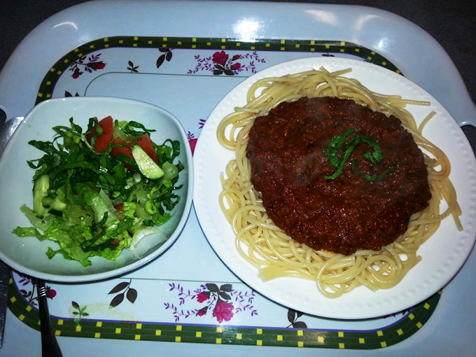 East meets West in this clever fusion dish. The Eritrean sauce transforms ordinary spaghetti into something extraordinary.