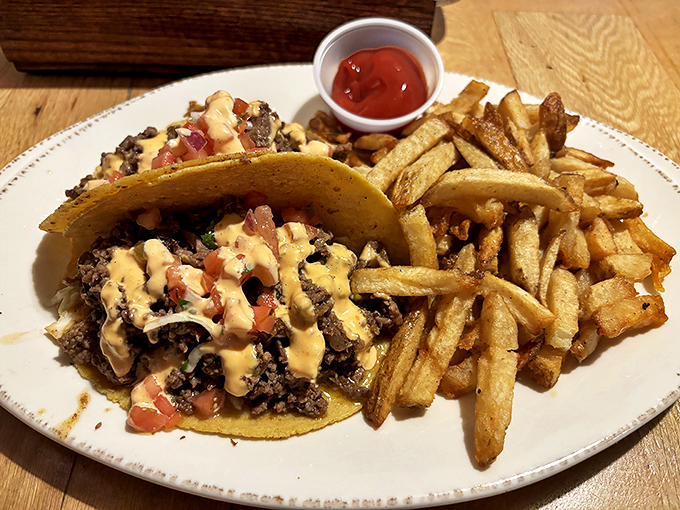 These tacos aren't just dinner, they're an event. Loaded with goodness and paired with fries that could make a French chef weep with joy. Photo credit: L S