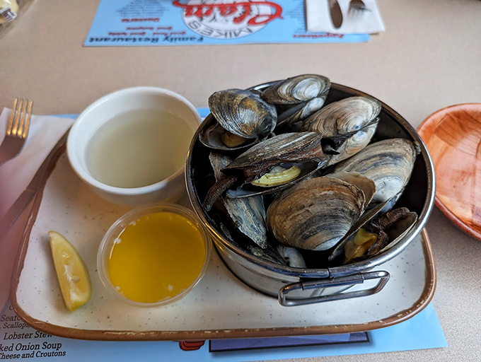 These plump steamed clams, swimming in golden butter, are basically nature's way of saying "dig in!"