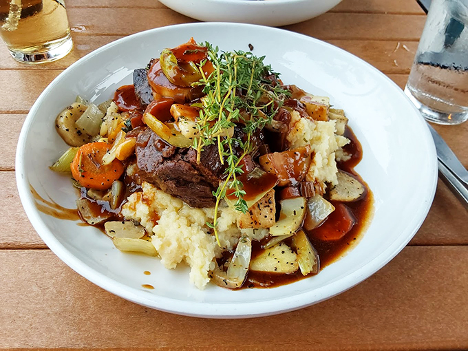 Ladies and gentlemen, the pi&egrave;ce de r&eacute;sistance! These braised short ribs are so tender, they practically melt at the mere sight of a fork. Photo credit: Luz Stella Kimpling
