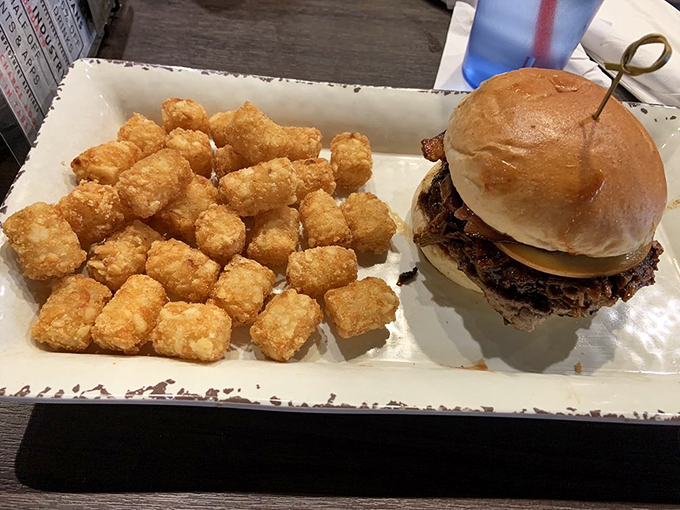 Behold, the burger of your dreams! This beefy beauty, nestled in a pillowy bun, is ready for its close-up... and your mouth.