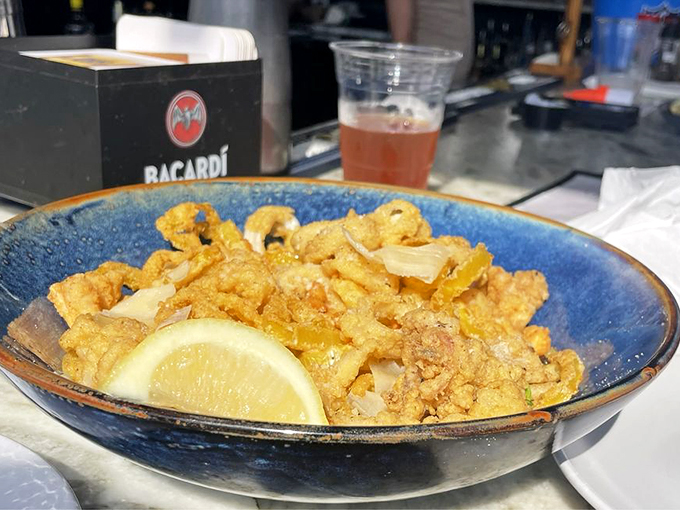 Calamari so golden, it could be mistaken for buried treasure. Neptune's rings, anyone?