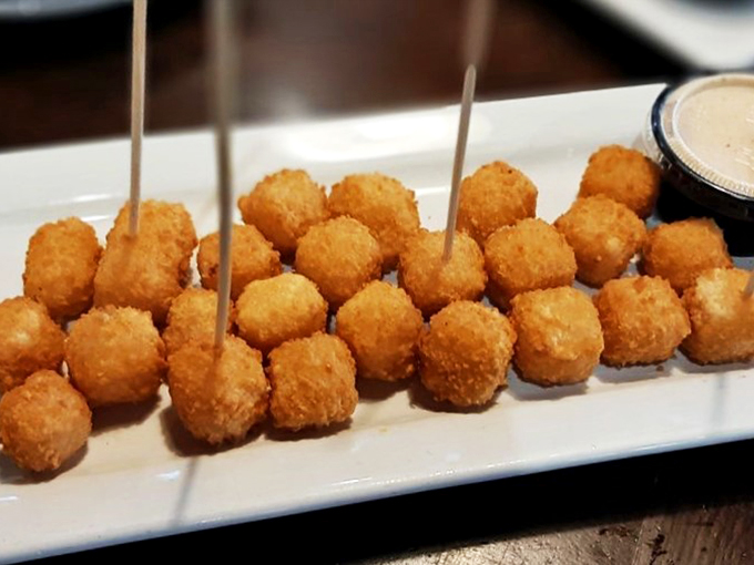 Cheesy does it! These golden orbs of gooey goodness are like edible sunshine, brightening your day one bite at a time. Resistance is futile!