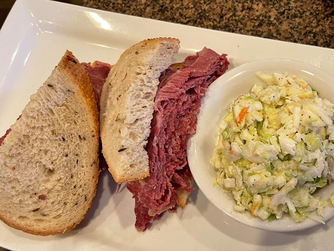 Behold, the Everest of sandwiches! This towering corned beef creation is a testament to the art of excess. Bring your appetite and maybe a sherpa.
