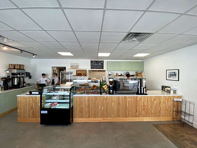 Behind this wooden-clad counter, magic happens daily as fresh-baked goods emerge like treasures from a culinary vault.