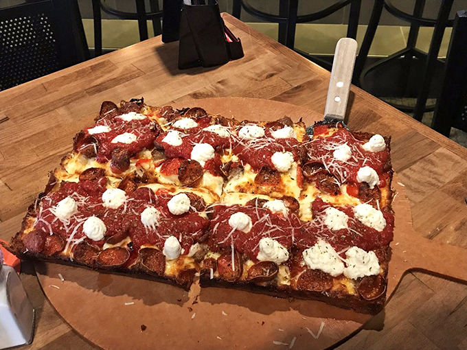 The Detroiter: where crispy edges meet gooey cheese in perfect harmony. It's the Motown of pizzas &ndash; a classic hit that never goes out of style.