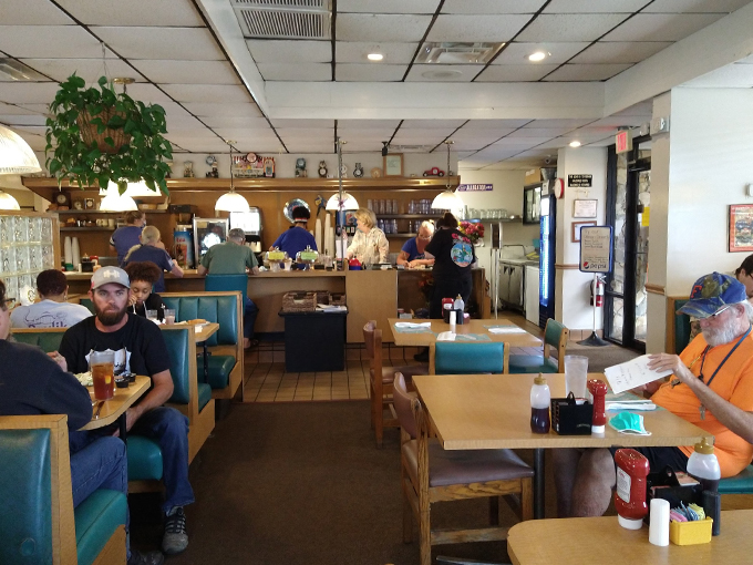 Where strangers become friends over forkfuls of pancakes. This bustling dining room is the heart of Gainesville's morning ritual. Photo credit: Jacqueline Brasil Baptista