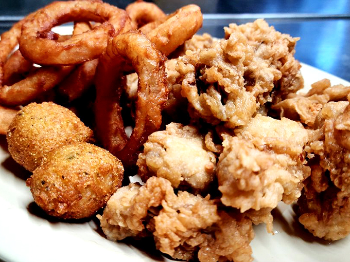 The sea's bounty, served with a side of Southern hospitality. These fresh oysters and crispy sides are like a beach vacation for your taste buds. Photo credit: Alexandrea A.