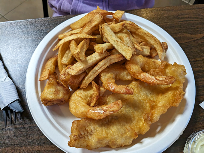 Golden-fried shrimp: because sometimes you need your seafood to crunch. It's like Neptune decided to open a chip shop on Mount Olympus.
