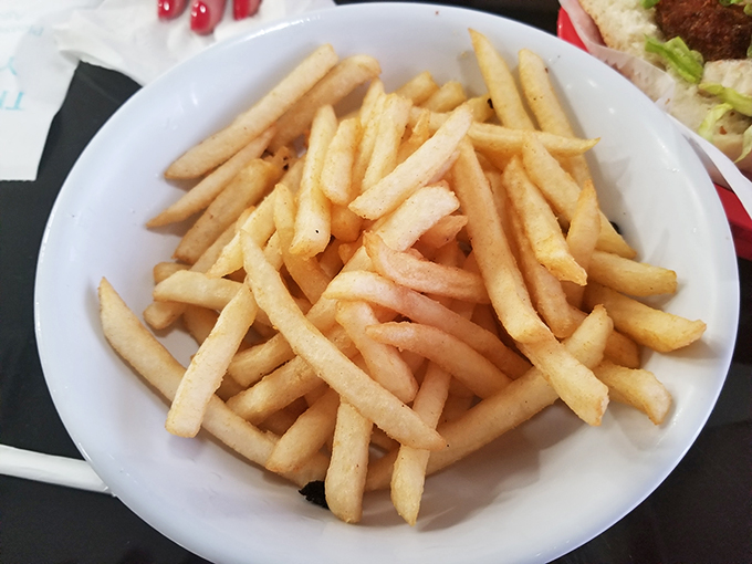 Golden, crispy, and utterly irresistible. These fries are the supporting actors that deserve an Oscar for Best Side Dish. Photo credit: Manolo Hernandez