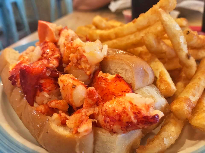 The Rolls-Royce of sandwiches! This lobster roll is so packed, it's like the crustaceans are having a reunion party in your mouth.
