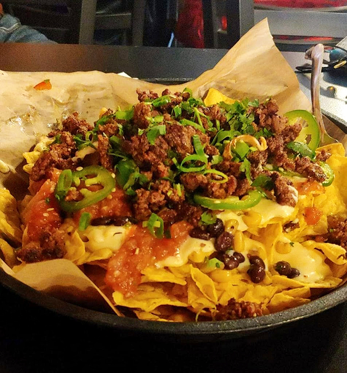 Nacho average appetizer! This mountain of cheesy, meaty goodness is like a fiesta for your taste buds.