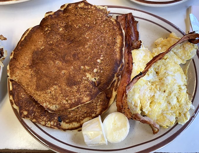 Pancakes so fluffy, they could double as pillows. Napping at the table strongly discouraged, no matter how tempting.